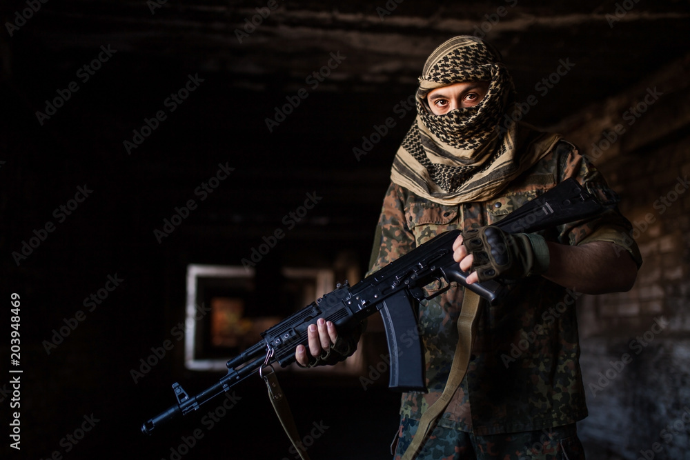 Photo & Art Print The Arab soldier with the AK-47 Kalashnikov assault ...