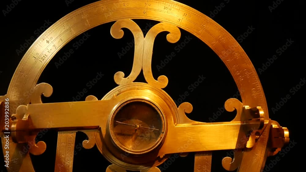 Time measurement using sunshine and compass. Equatorial sundial. Stock ...