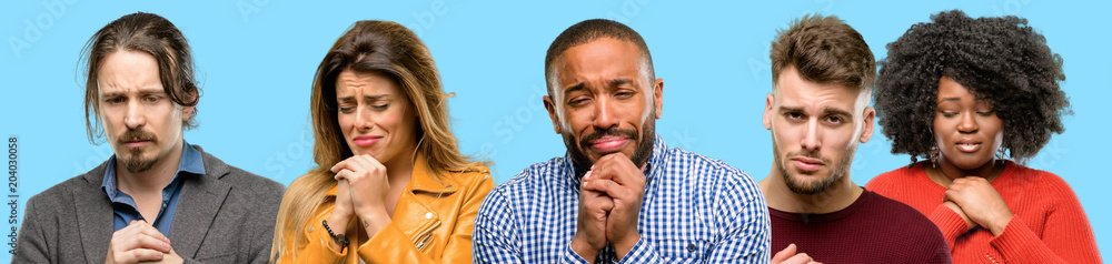 Group of mixed people, women and men crying depressed full of sadness ...