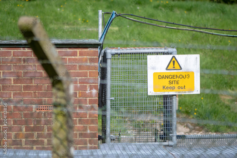 Dangerous Site Keep Out sign. Warning at industrial facility Stock ...