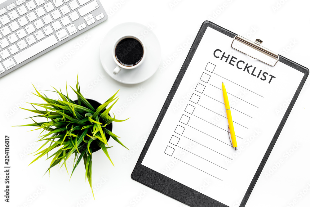 Blank checklist with space for ticks on pad on office desk. Checklist ...