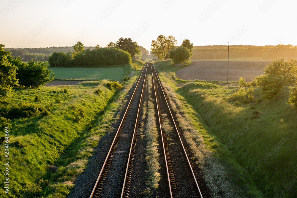 Railway tracks seen from the railway viaduct. The railway line with two ...