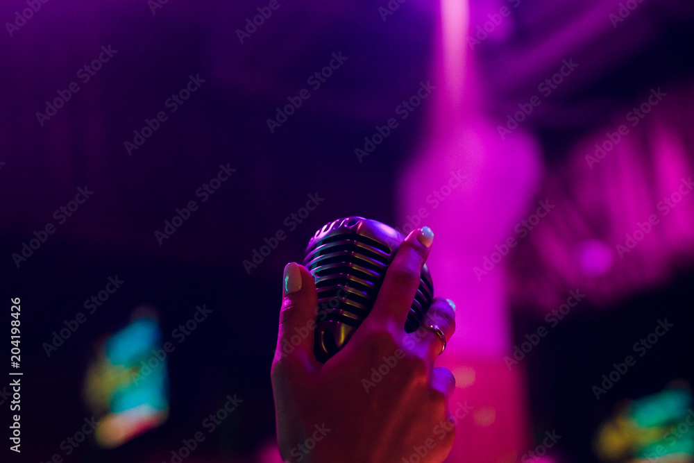 microphone on stand up comedy stage with reflectors ray, high contrast ...