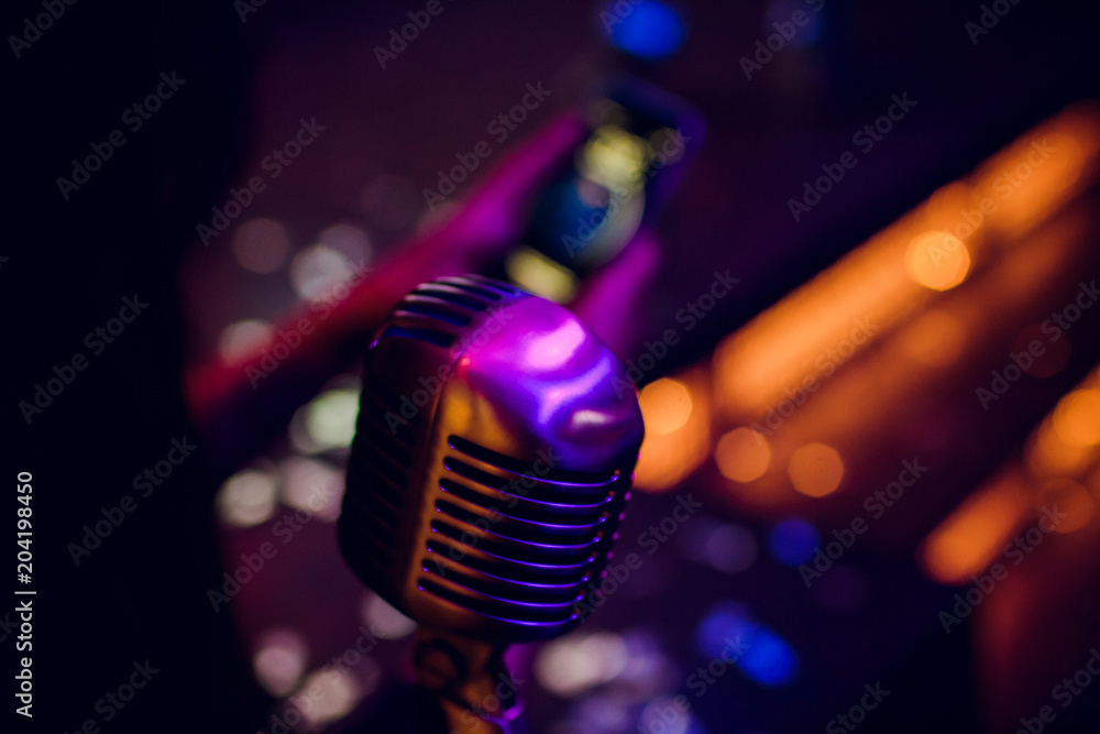 microphone on stand up comedy stage with reflectors ray, high contrast ...