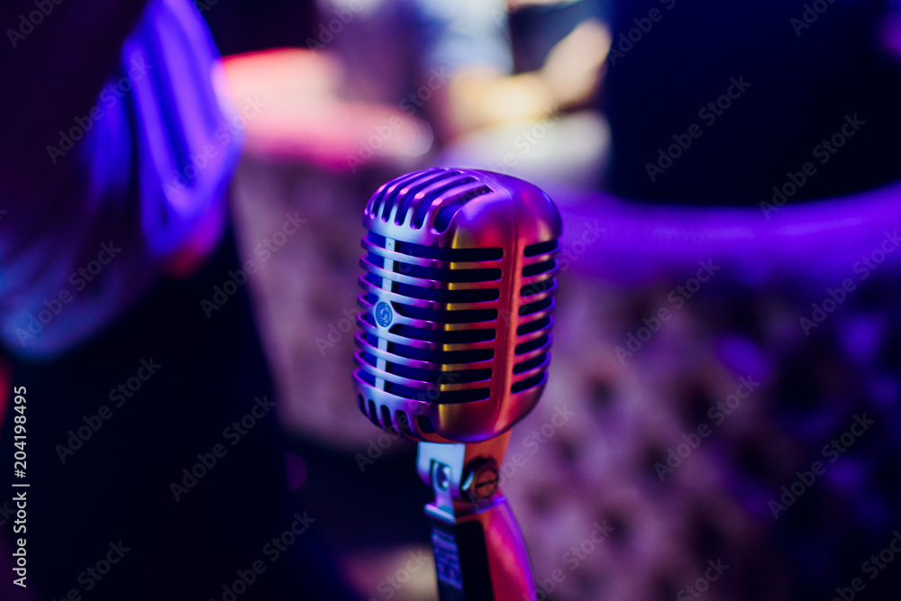 microphone on stand up comedy stage with reflectors ray, high contrast ...