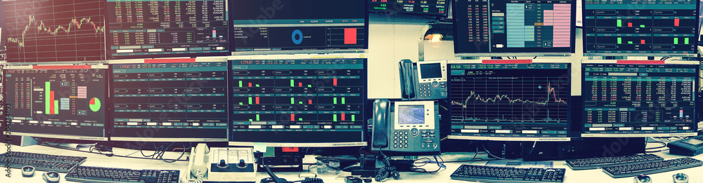 Display of Stock market quotes and chart in monitor computer room with ...