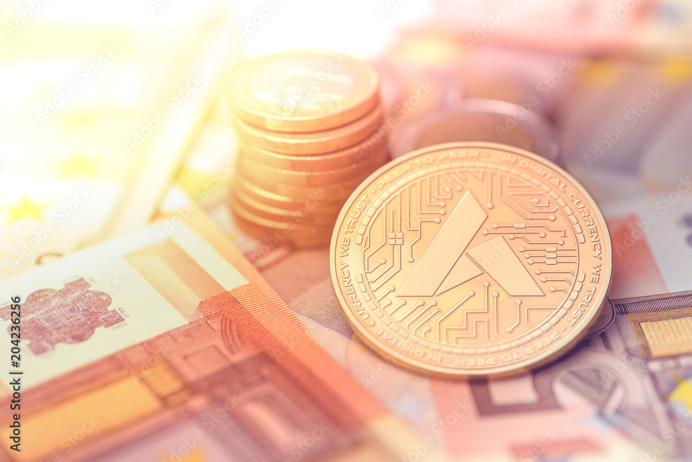 shiny golden ARDOR cryptocurrency coin on blurry background with euro ...