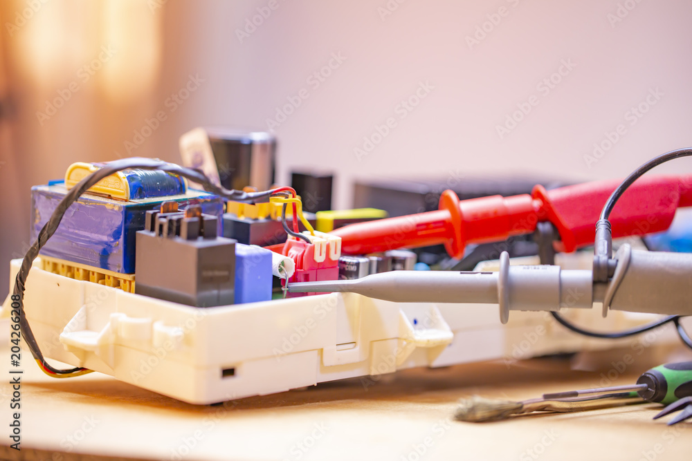 Repair Work Of Electronic Circuit Bord With Oscilloscope Probe Connect ...