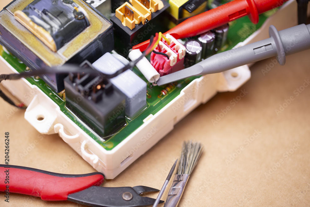 Repair Work Of Electronic Circuit Bord With Oscilloscope Probe Connect ...