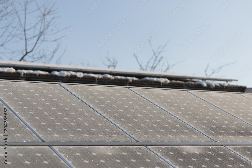 solar photovoltaics pannels or solar modules phin winter morning with ...