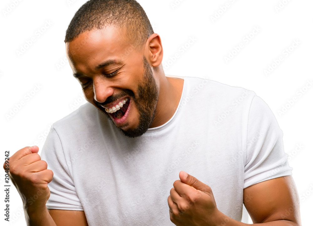 African american man with beard happy and excited celebrating victory ...