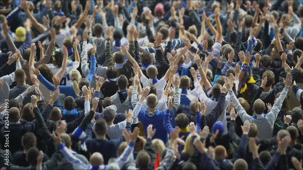 Excited football fans clapping hands at stadium, supporting their team ...