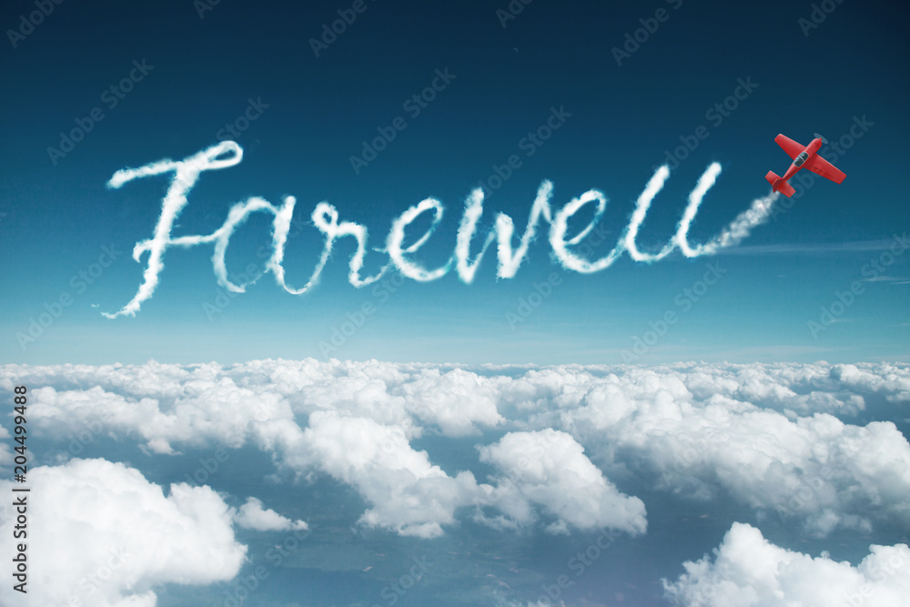 farewell word created from a trail of smoke by Acrobatic plane. Stock ...
