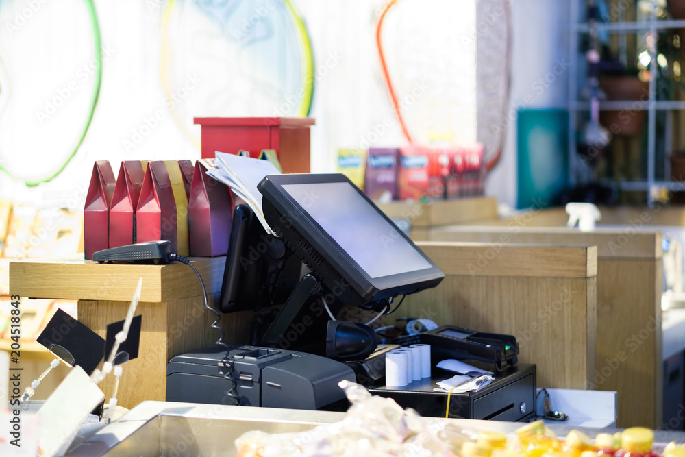 Cash desk terminal with screen in small cafe Stock Photo | Adobe Stock