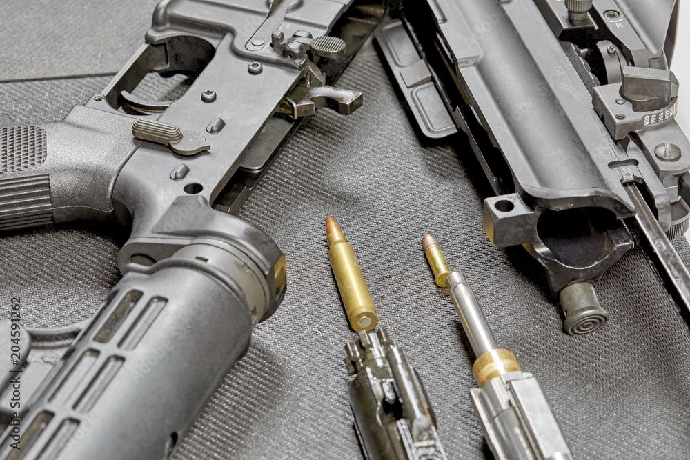Two Different Calibers of Bullets for an AR15 Rifle Photos | Adobe Stock