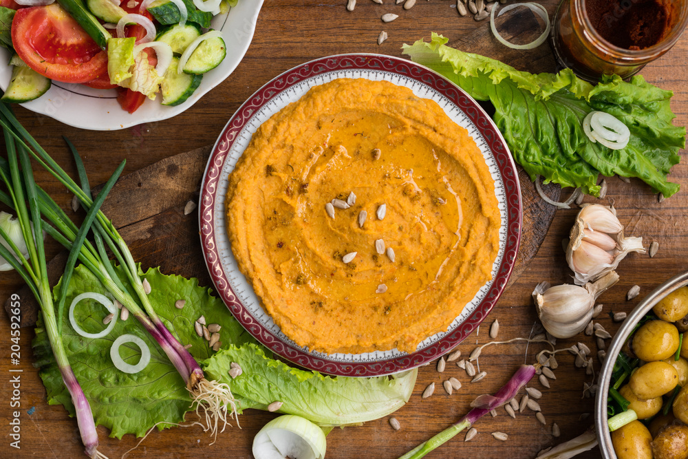 Israeli hummus with chickpea, tahini, olive oil, garlic. Traditional ...