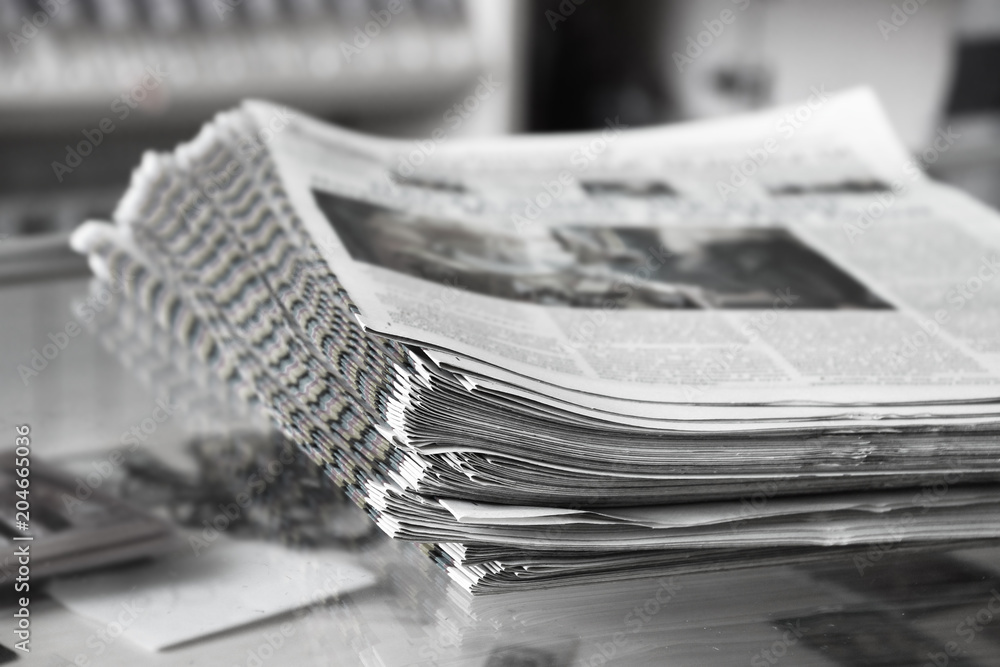 Stack of newspapers on the newspaper stand, close up Stock Photo ...