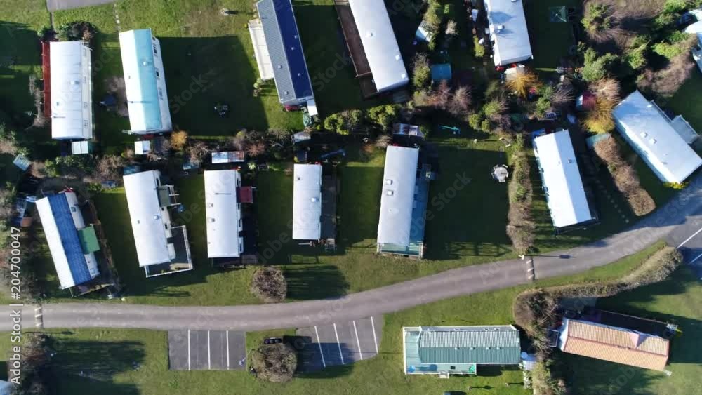 Aerial top down view footage of Farm Campsite and Holiday Park moving ...
