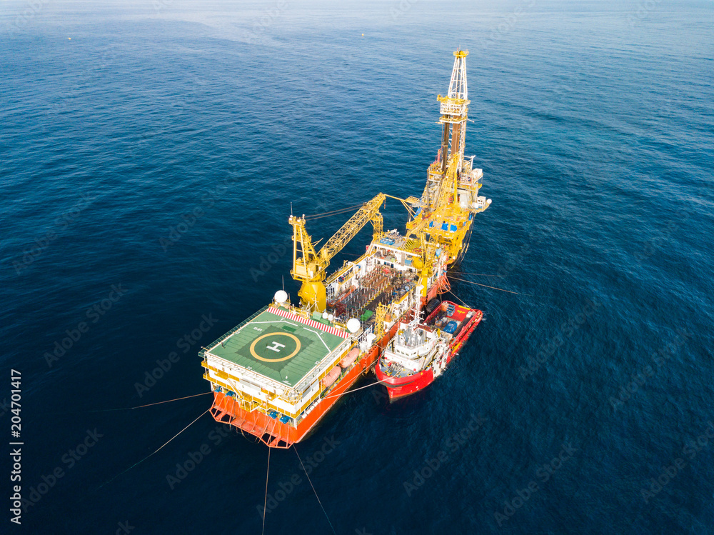 Aerial View of Tender Drilling Oil Rig (Barge Oil Rig) in The Middle of ...