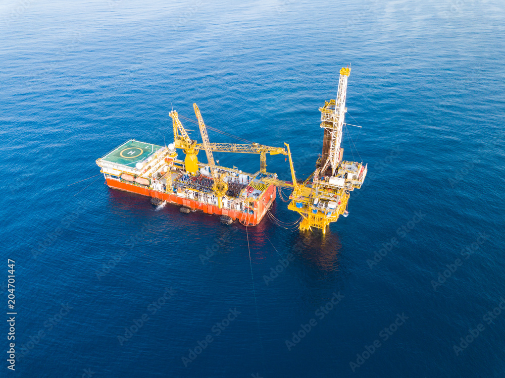 Aerial View of Tender Drilling Oil Rig (Barge Oil Rig) in The Middle of ...