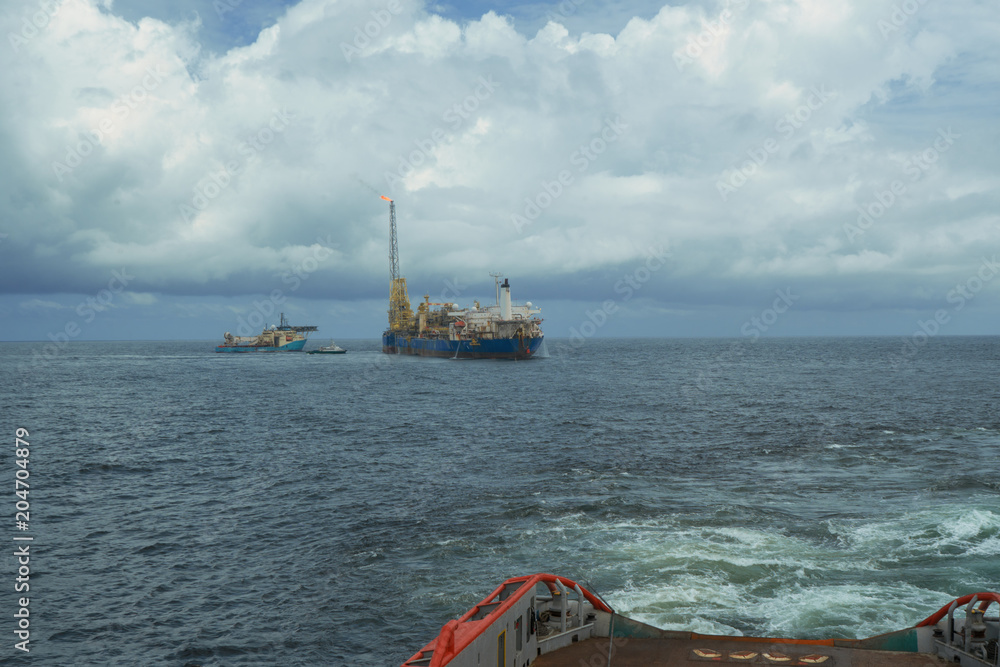 Anchor-handling Tug Supply AHTS vessel during dynamic positioning ...