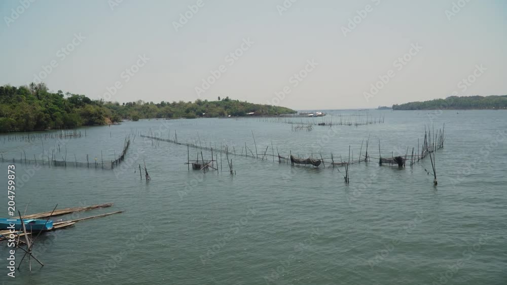 Fish farm with cages for fish and shrimp in the Philippines, Luzon ...