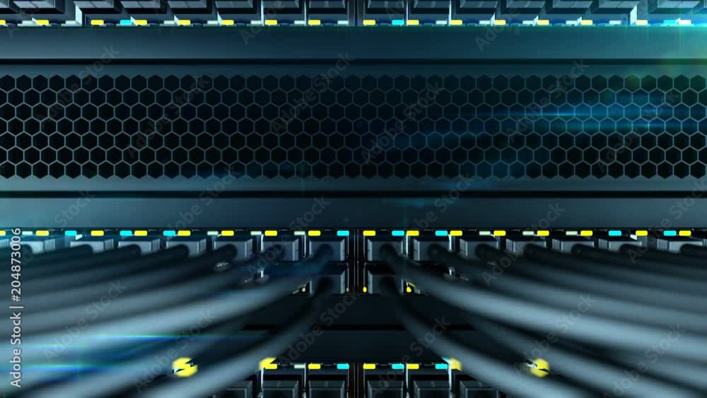 Camera moves from bottom to top of a server rack. In a server rack ...