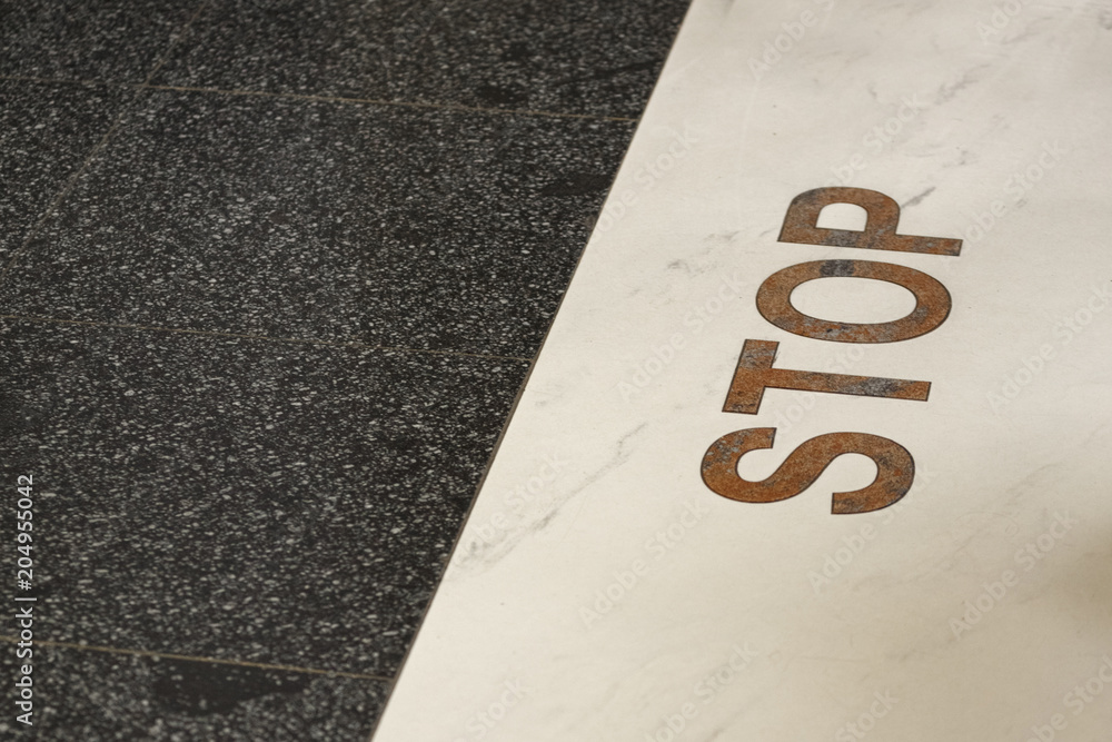 Stop sign on the line on the floor. Concept: stop line, deadline Stock ...