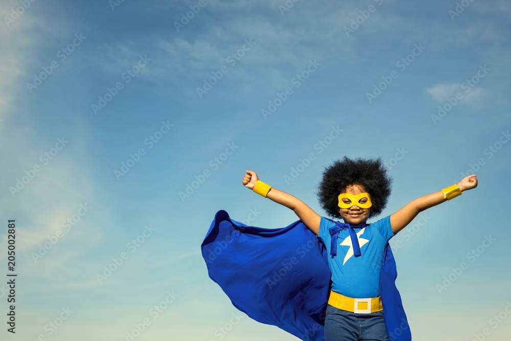 Strong superhero girl with superpowers Stock Photo | Adobe Stock