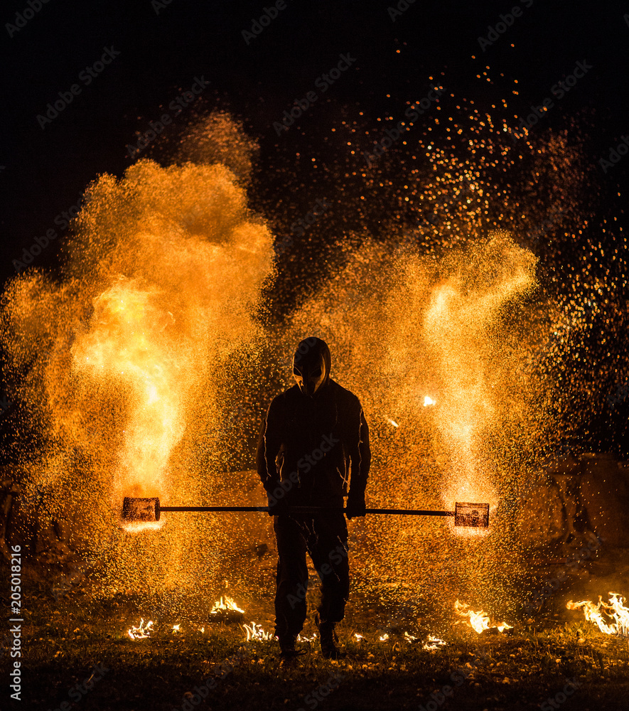 Fiery show with sparks, at a short shutter speed with additional light ...