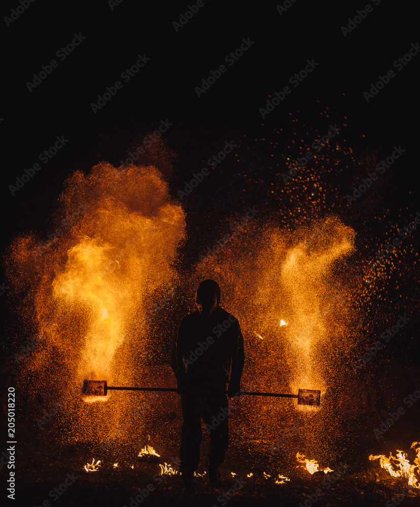 Fiery show with sparks, at a short shutter speed with additional light ...