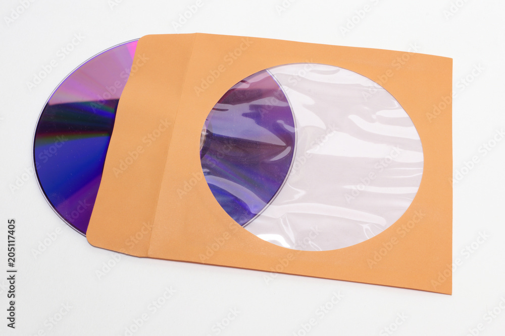 DVD compact disc sticking out of orange paper envelope with flap and ...