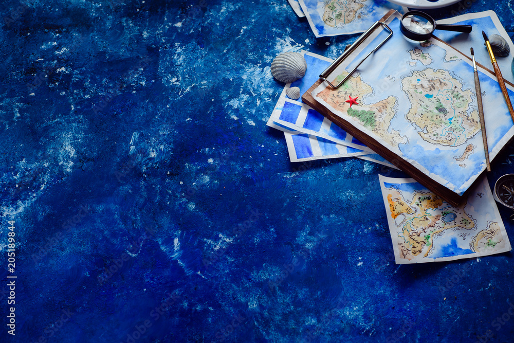 Handpainted fantasy map on a navy blue background with copy space ...
