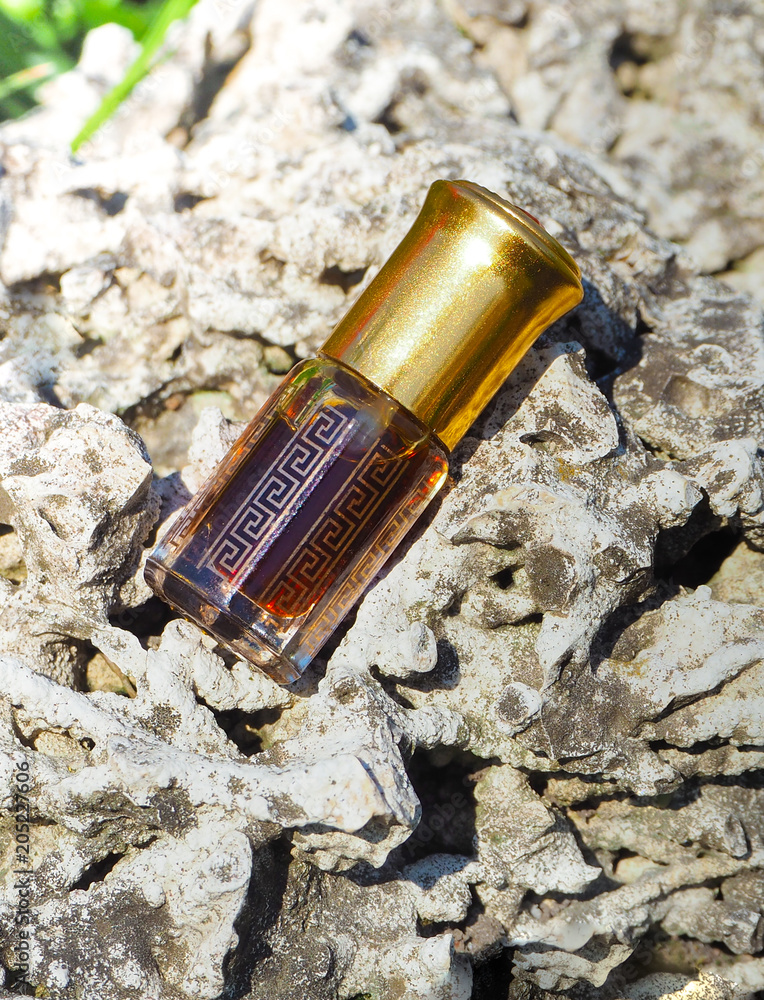 Arabian oud attar perfume or agarwood oil fragrances in mini bottle ...