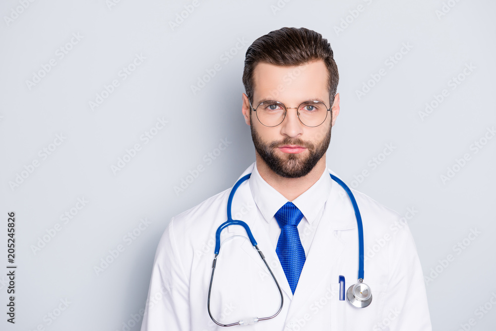 Portrait of trendy modern doc with stubble and modern hairstyle in ...
