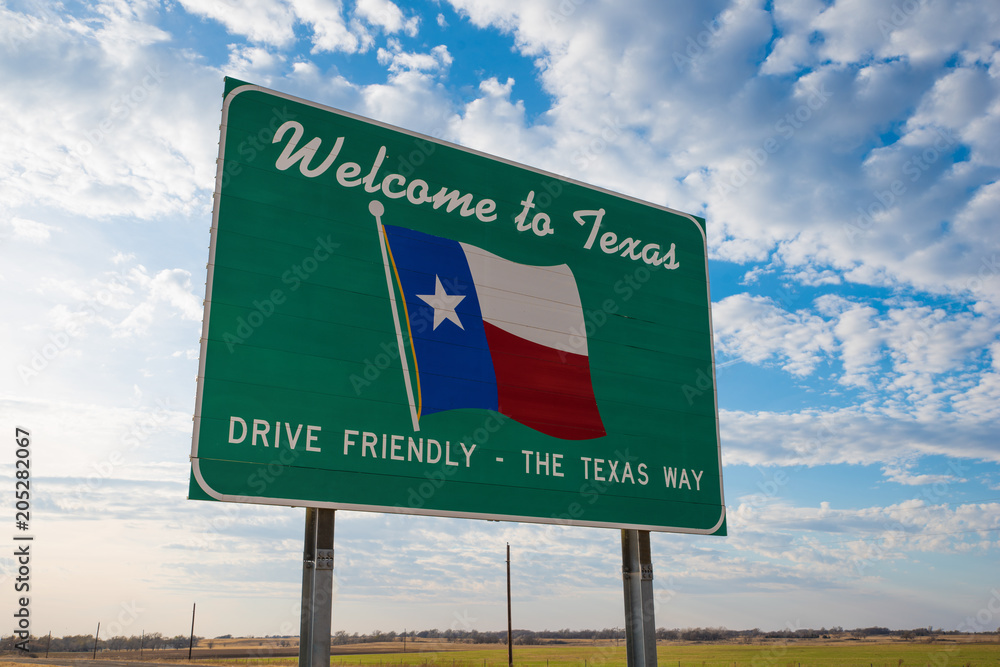 Welcome to Texas road sign in front of cloudy sky Stock Photo | Adobe Stock