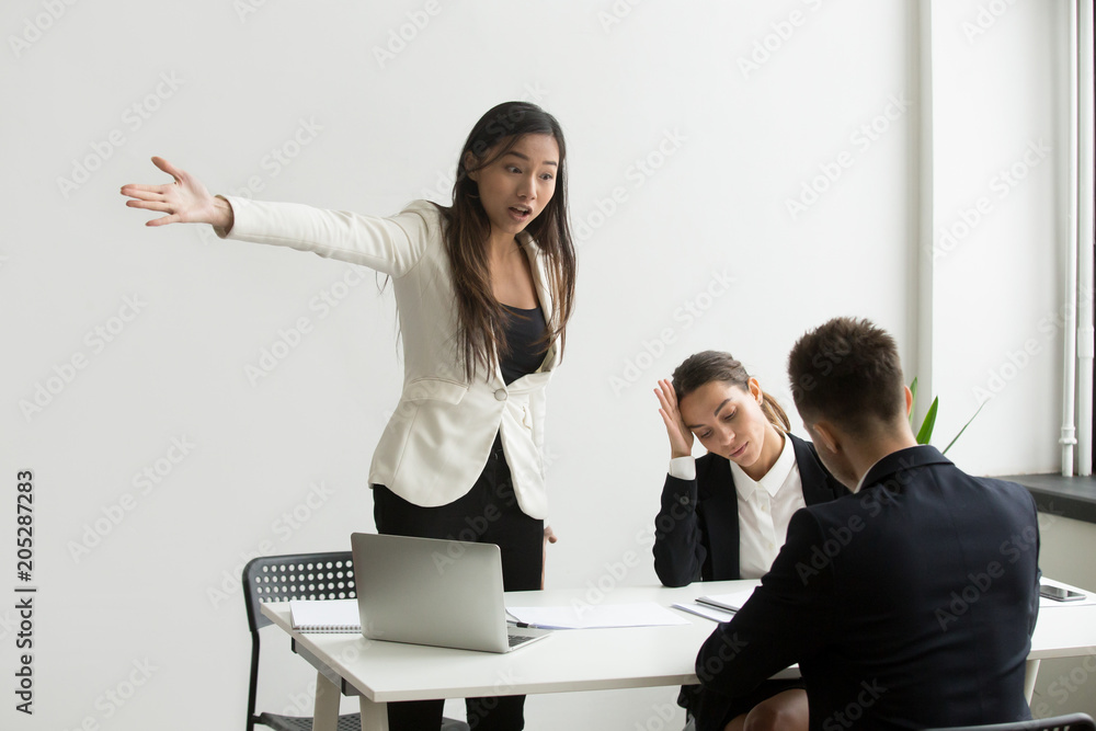 Angry mad HR manager pointing at door, making verbal sign for job ...