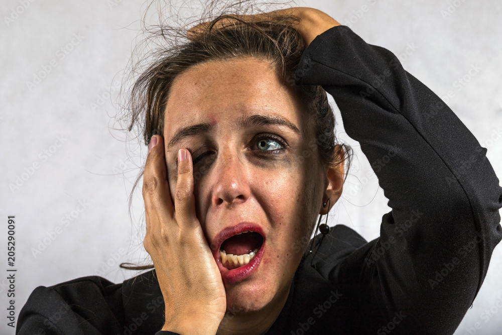 Desperate woman crying disheveled with pale eyes with makeup clouded ...