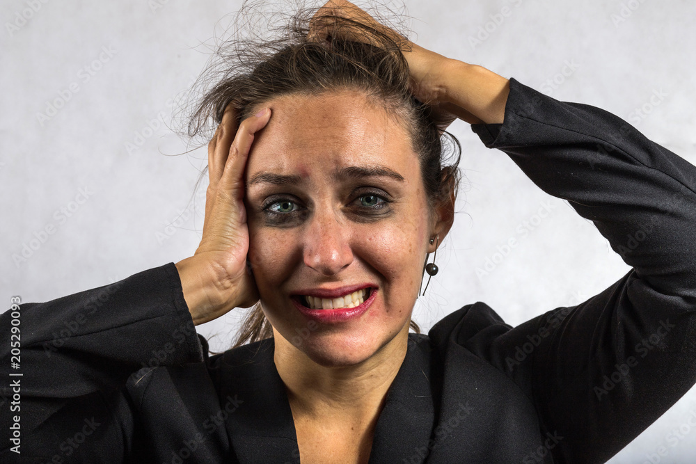 Desperate woman crying disheveled with pale eyes with makeup clouded ...