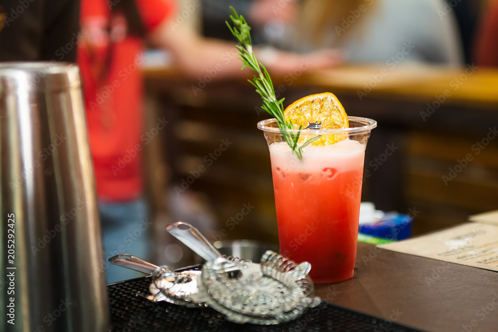Alcohol cocktail glass on bar counter. Fresh coctail on a color ...