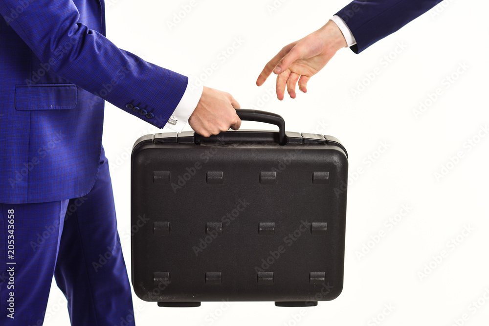 Male hand carry briefcase for exchange. Handover of case Stock Photo ...