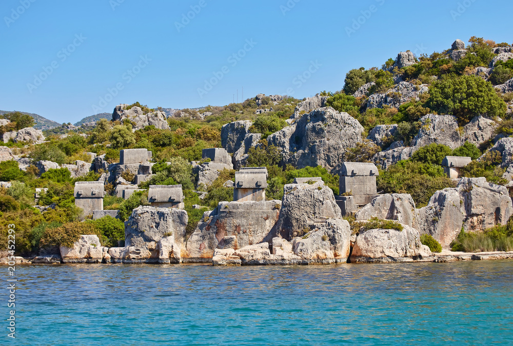 Lycian stone sarcophagus with pointed lid of the roman era popping up ...