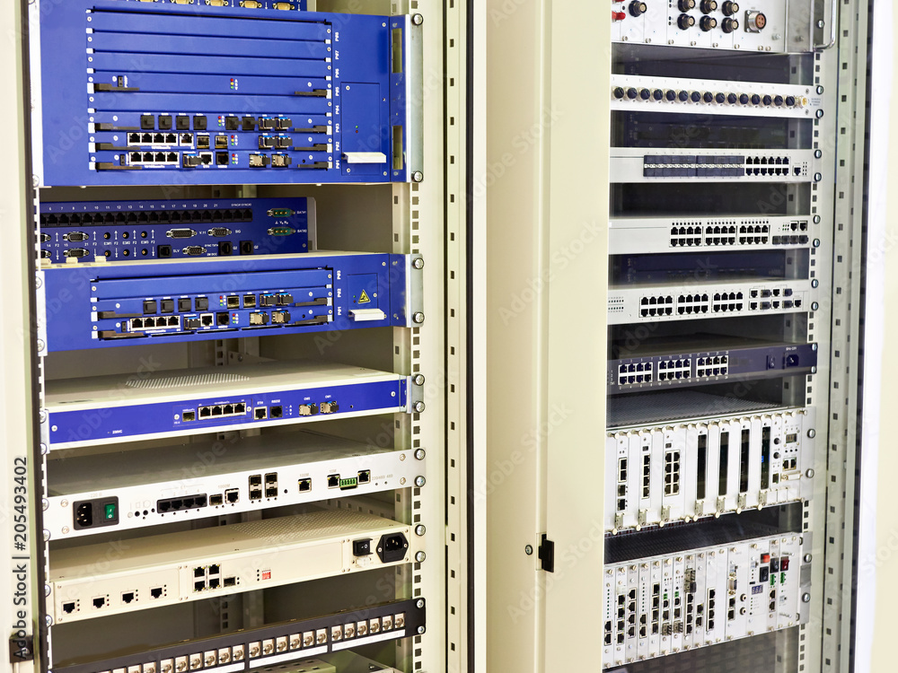 Racks with network switches and routers Stock Photo | Adobe Stock
