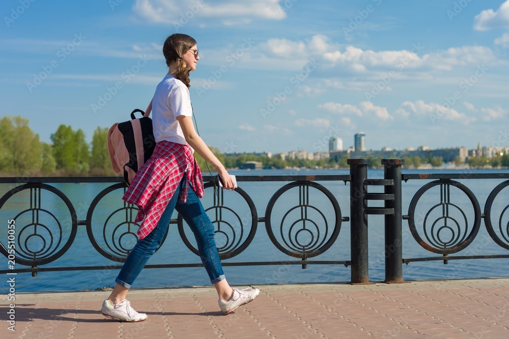 Student teen girl portrait with backpack outdoor in street smiling ...