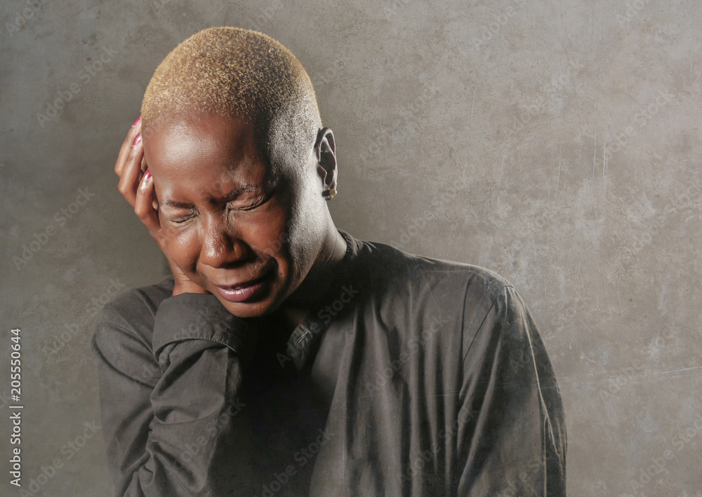 Foto de young stylish sad and depressed afro american black woman ...