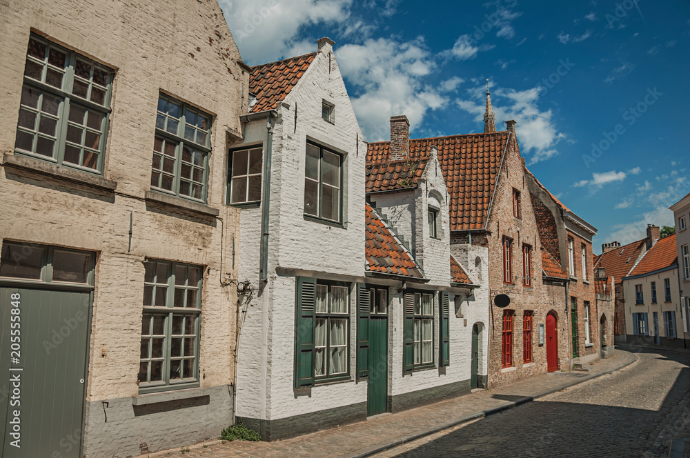 Brick facade of houses in typical style of the Flanders’s region in ...