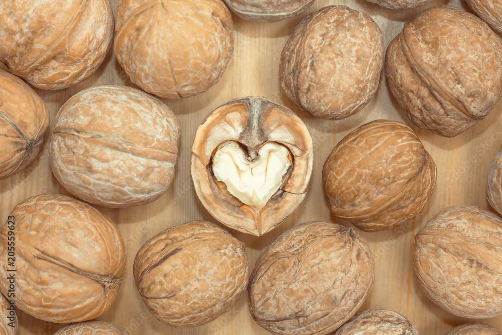 Walnut heart shaped and whole nuts. concept of love for nuts, health ...