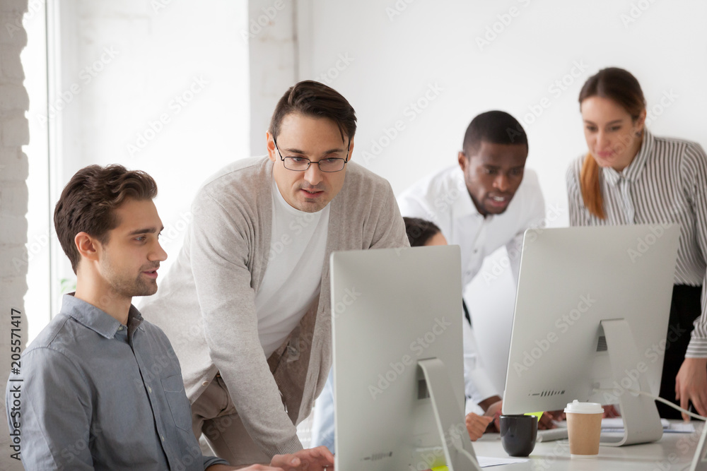 Corporate mentor teaching intern helping and supervising online ...