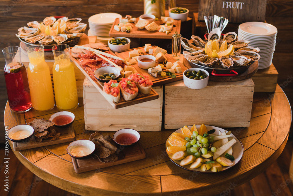Catering banquet table at reception. Restaurant presentation, european ...