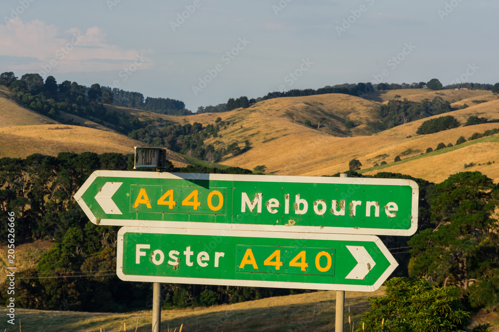 Road signs pointing towards Foster and Melbourne in South Gippsland ...
